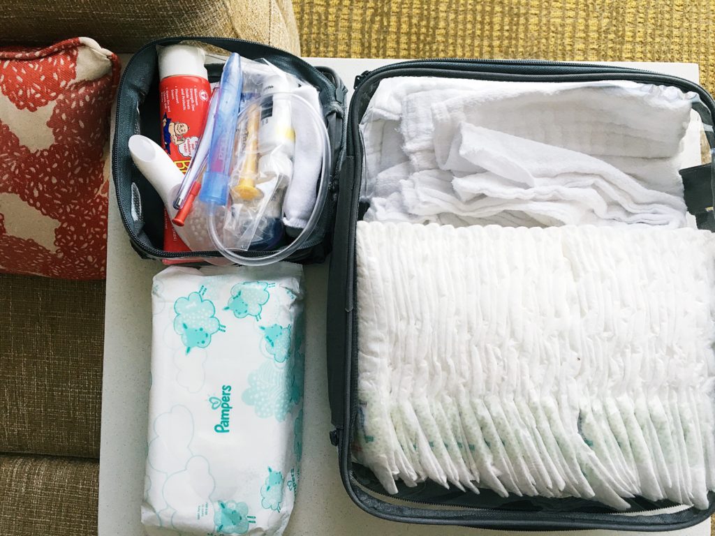 How To Pack For Travel With a Baby (featuring EZPacking) - Taylor-made Mama